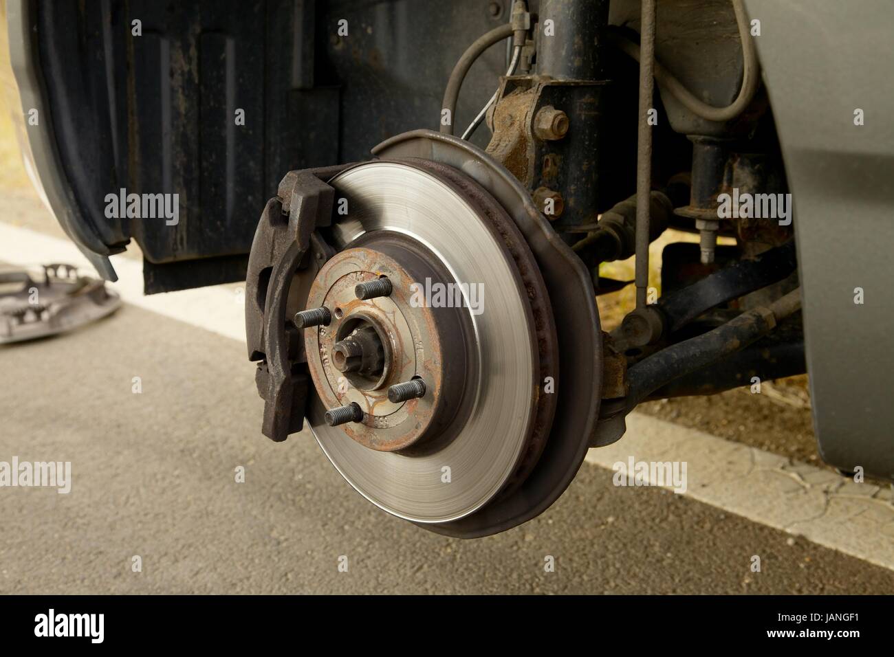 Changing wheels on a car Stock Photo - Alamy