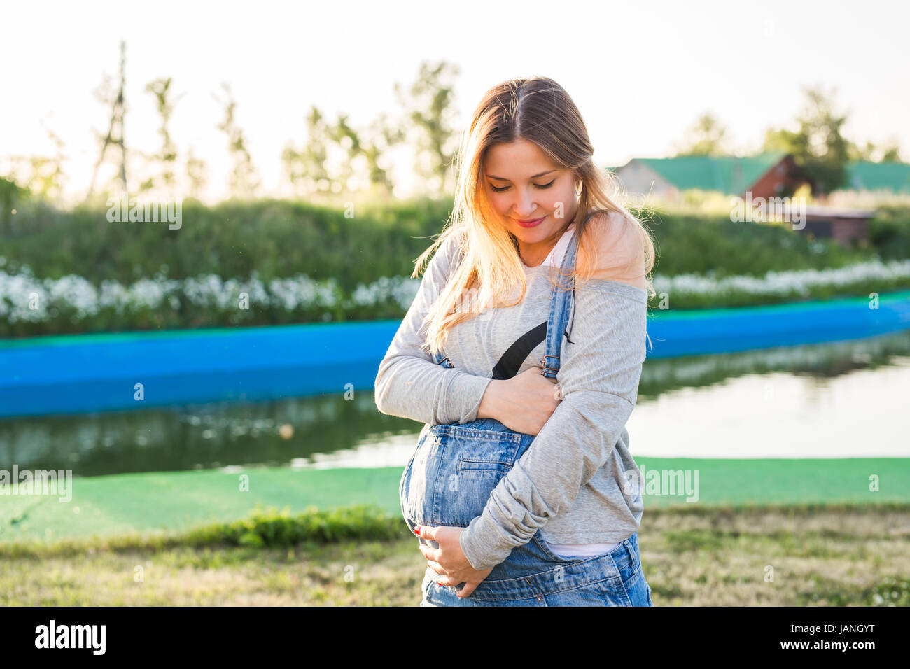Stomach hugging human hi-res stock photography and images - Alamy