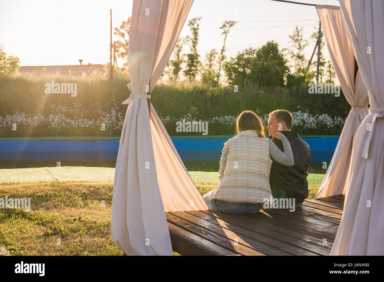 couple hugging in nature back view Stock Photo - Alamy
