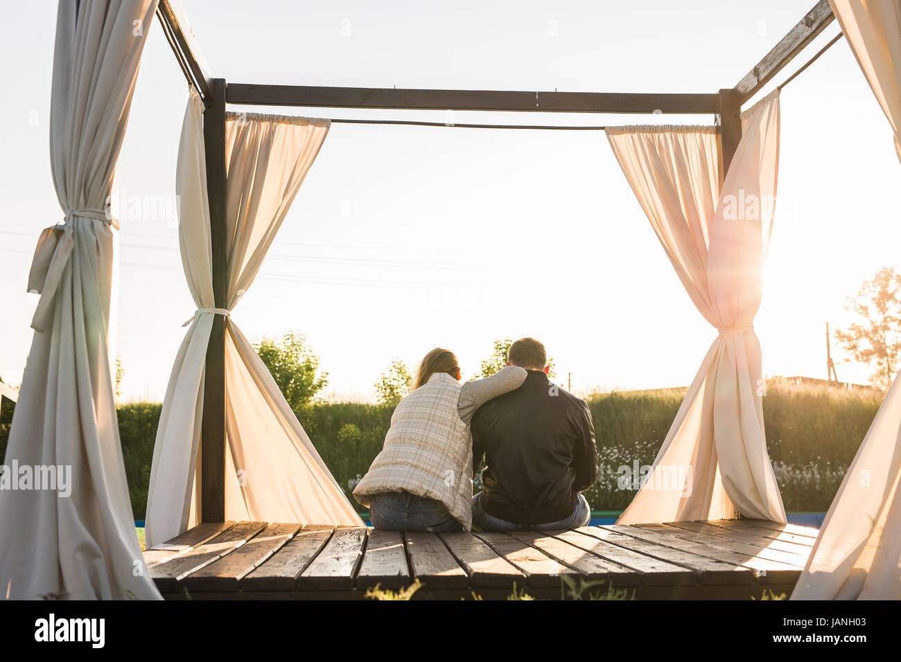couple hugging in nature back view Stock Photo - Alamy