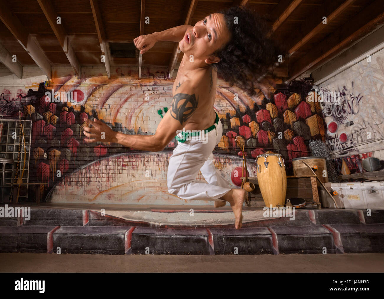 Capoeira brazilian man jumping white hi-res stock photography and ...