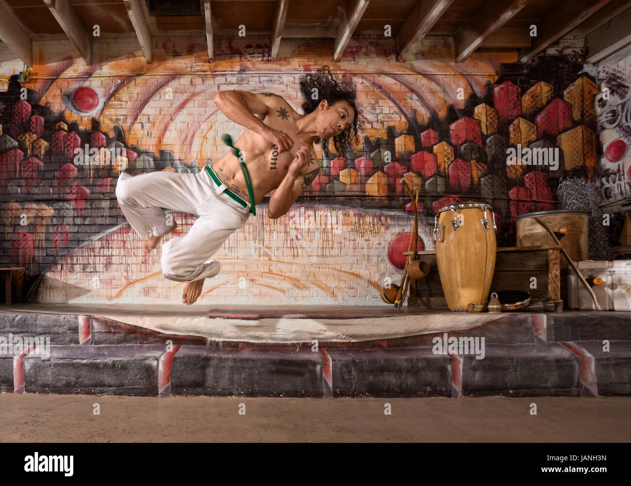 Capoeira brazilian man jumping white hi-res stock photography and ...