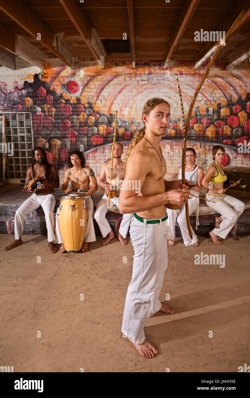 Group of 6 traditional Capoeira performers in urban building Stock ...