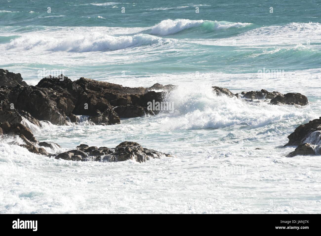 Rocks battered waves hi-res stock photography and images - Alamy