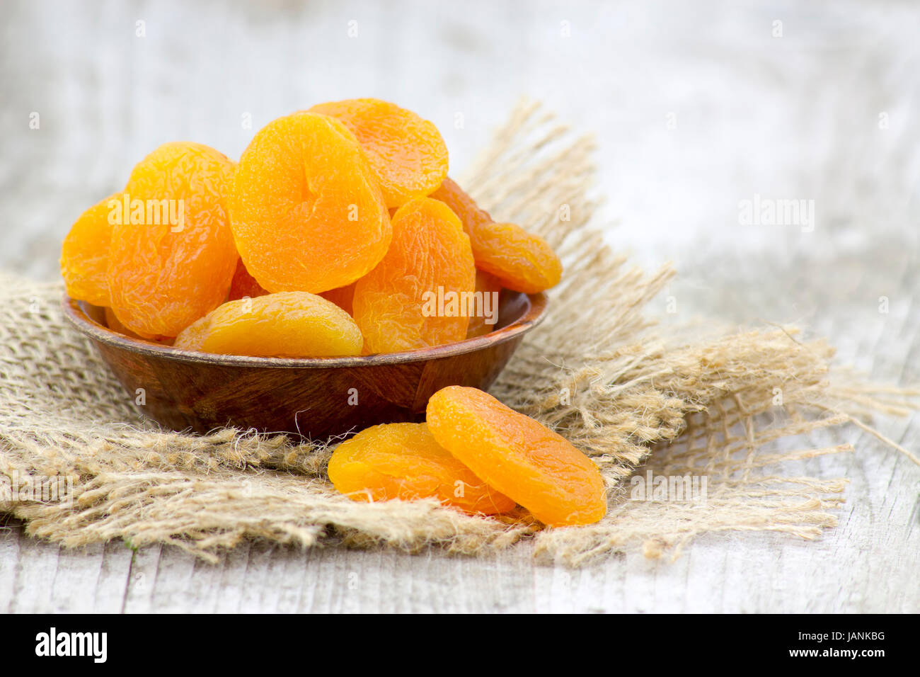 bowl full of dried apricots Stock Photo - Alamy