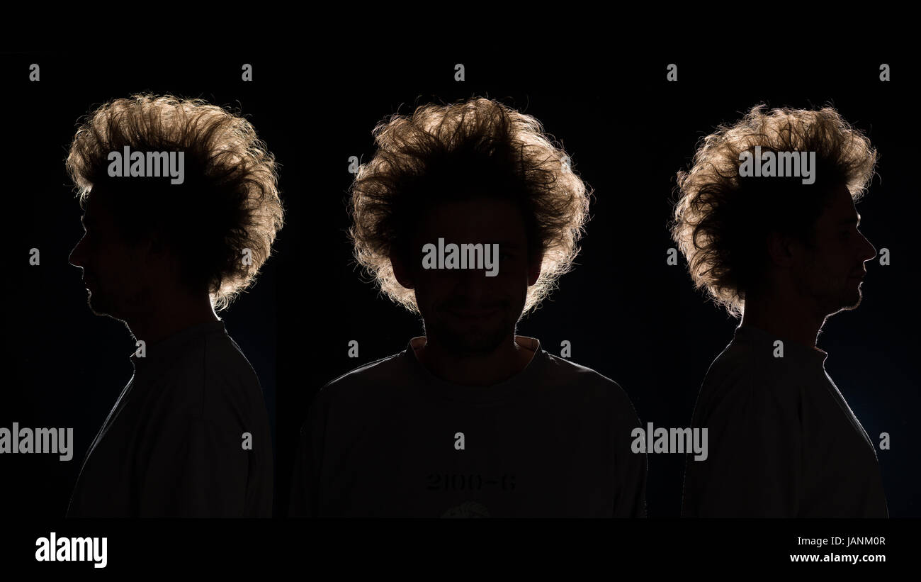 three men in black shadow on black background Stock Photo - Alamy