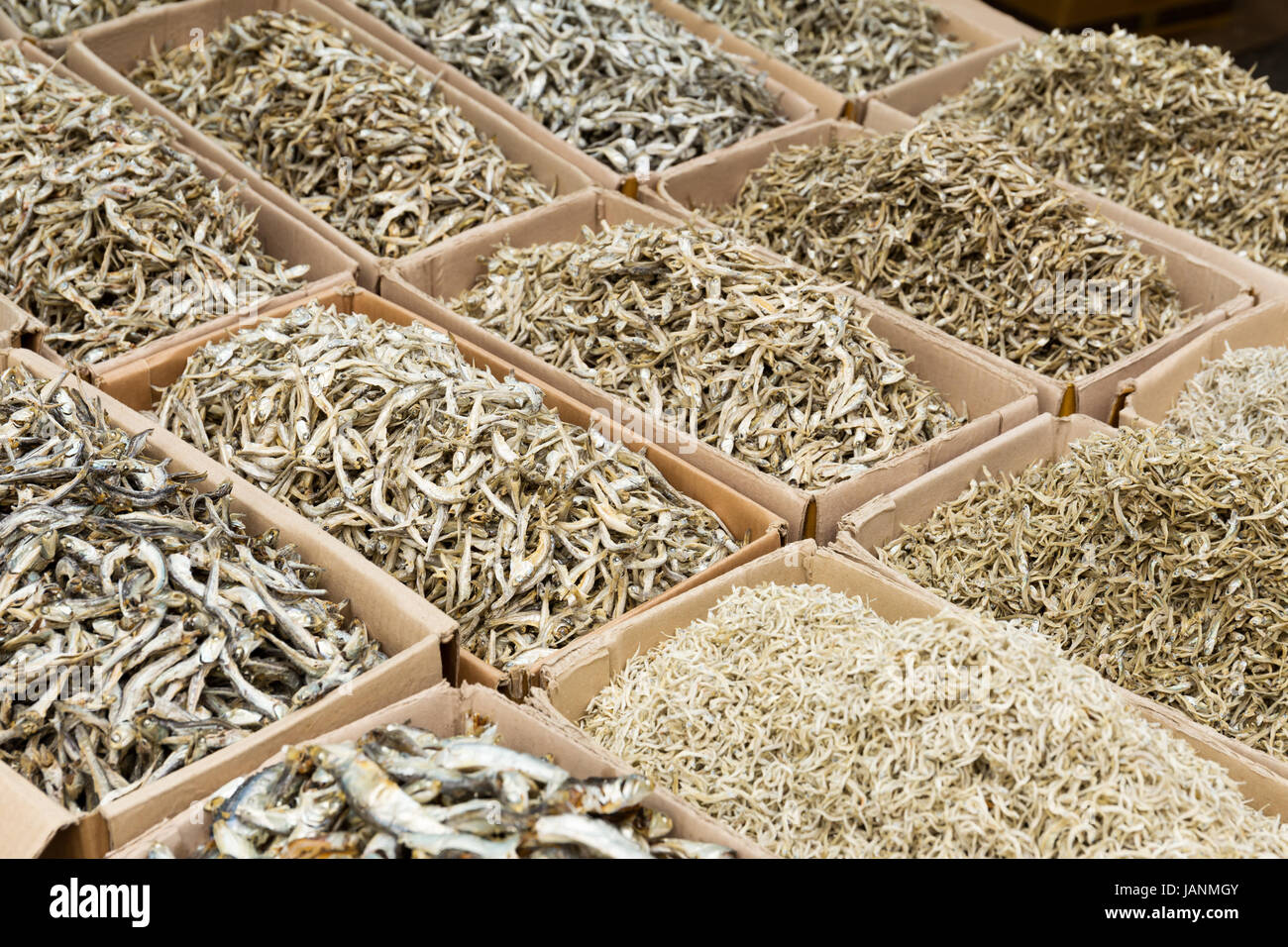 Dried assorted small white fish Stock Photo - Alamy
