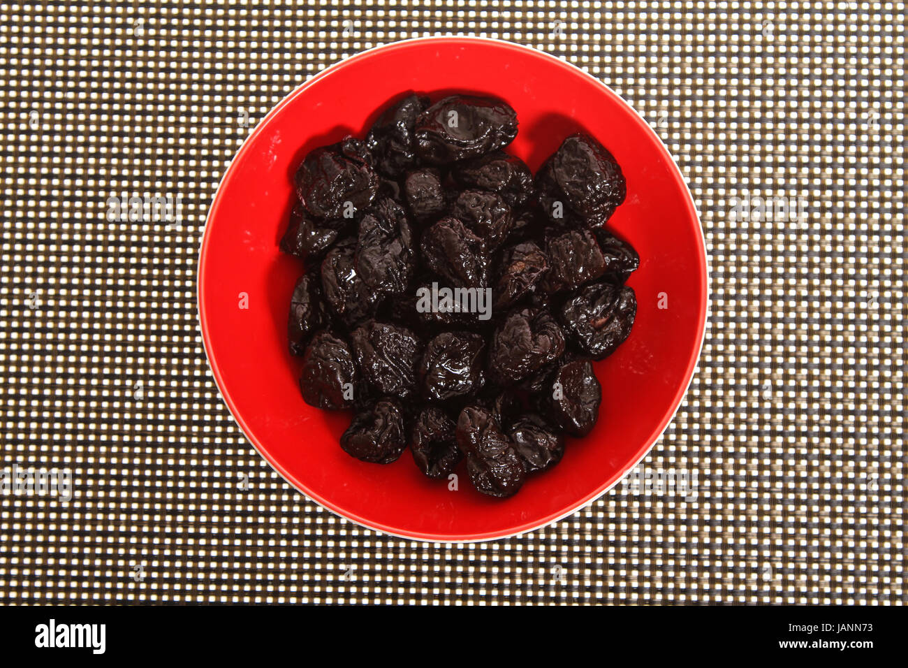 A pile of prunes on a bowl Stock Photo - Alamy