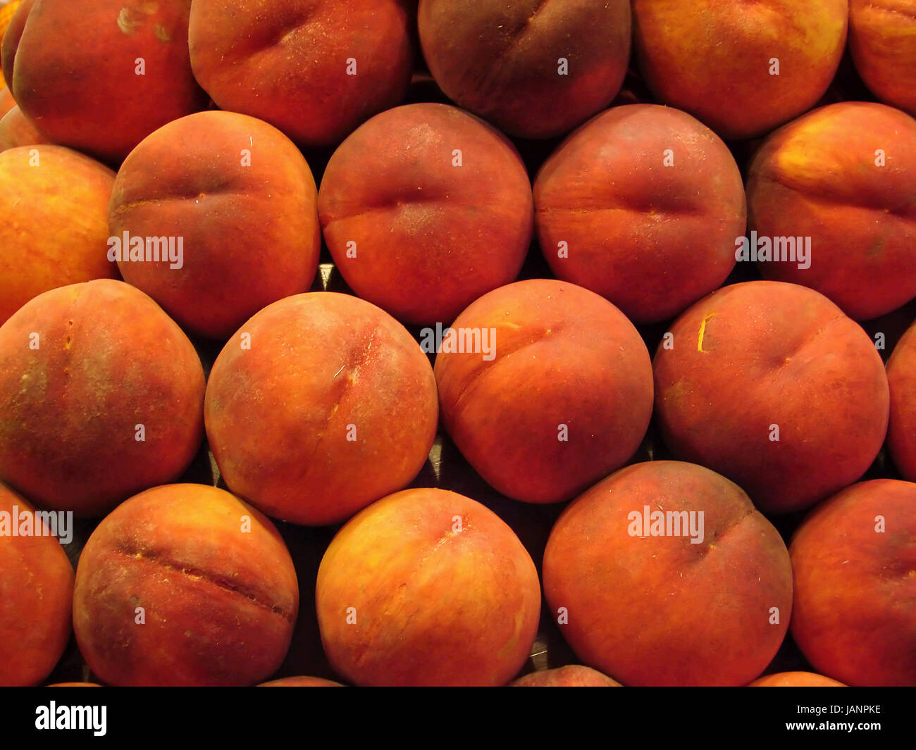 wall created from many delicious arranged peaches - stall Stock Photo ...