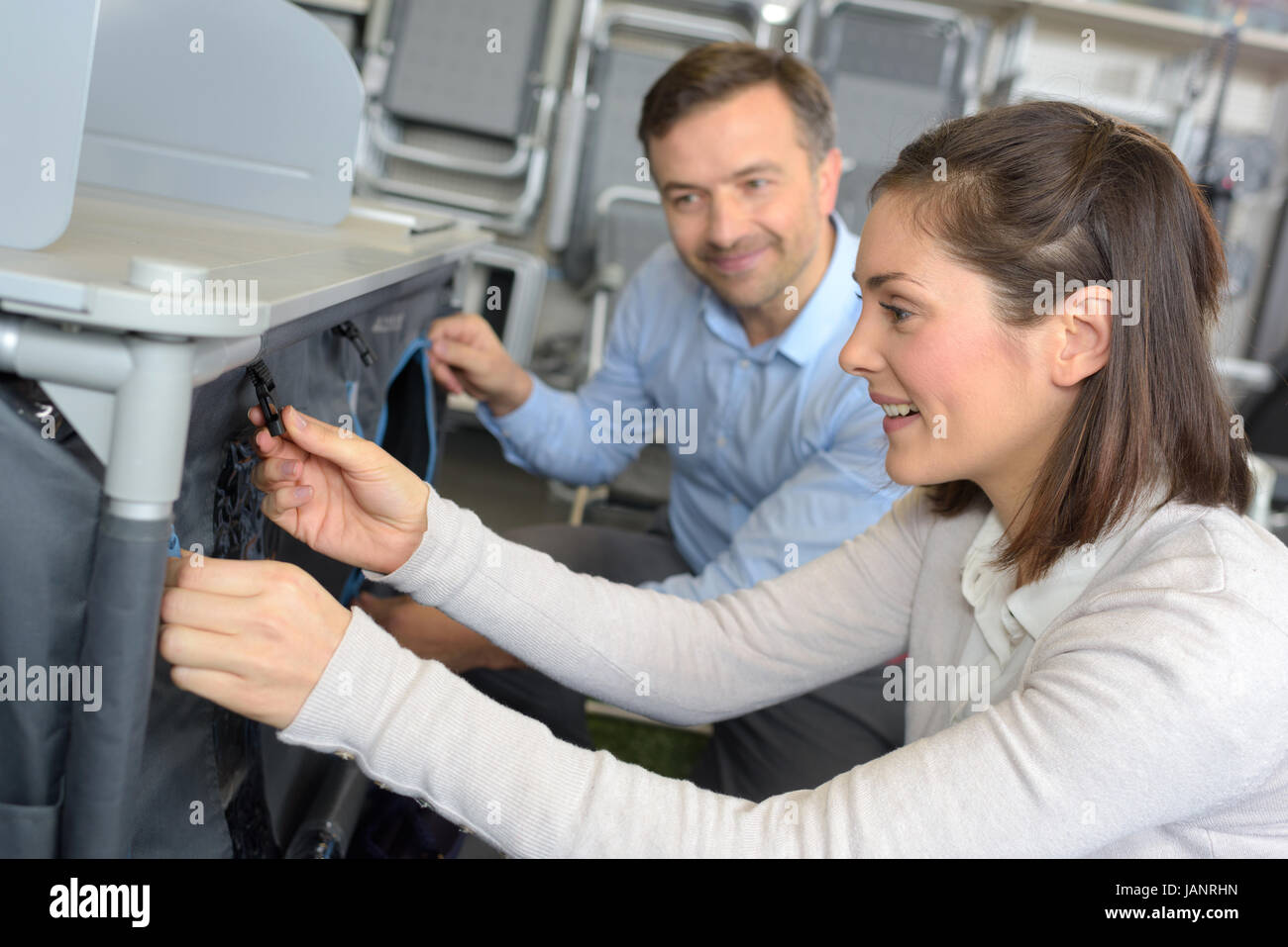 Man woman fitting table hi-res stock photography and images - Alamy