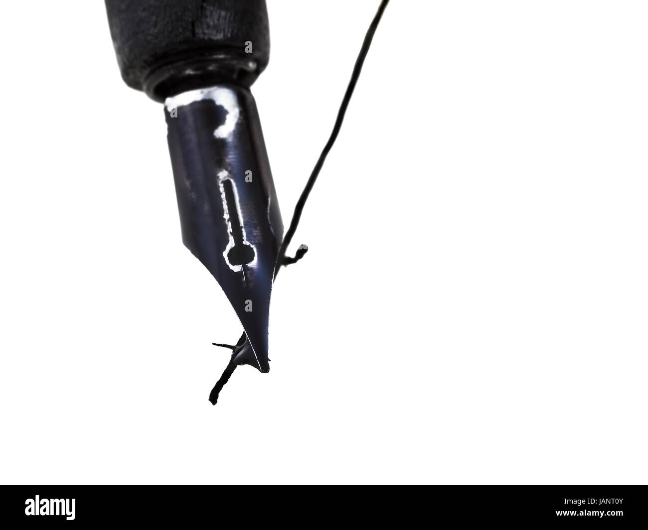 drawing pen with metal nib drafting straight line by black ink on white ...