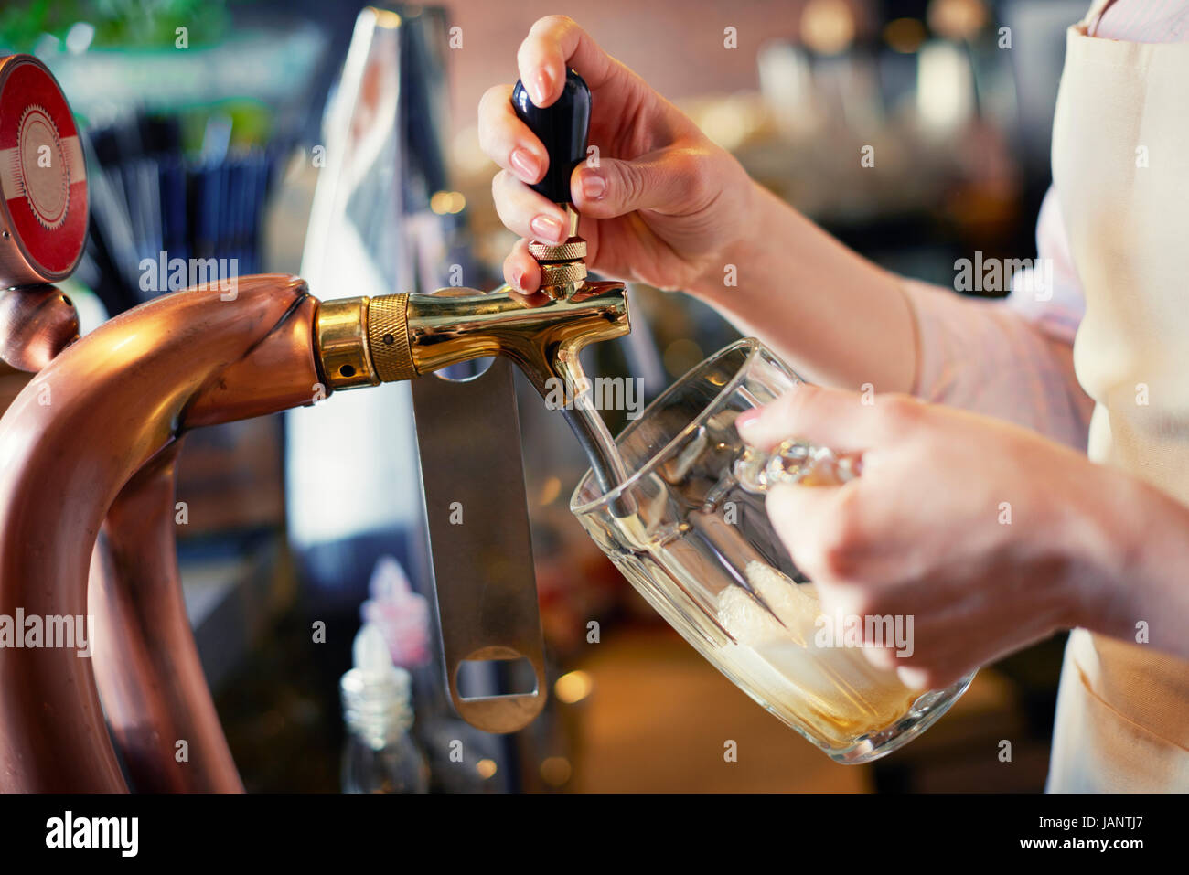 Woman beer glass pouring hi-res stock photography and images - Alamy
