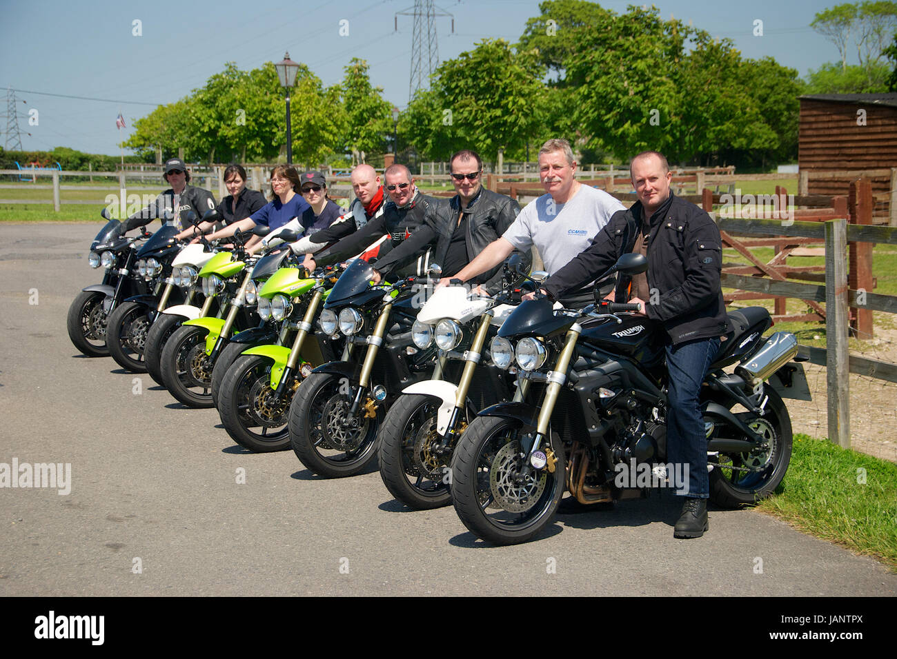 Group of riders on Triumph Street Triple motorcycles Stock Photo - Alamy