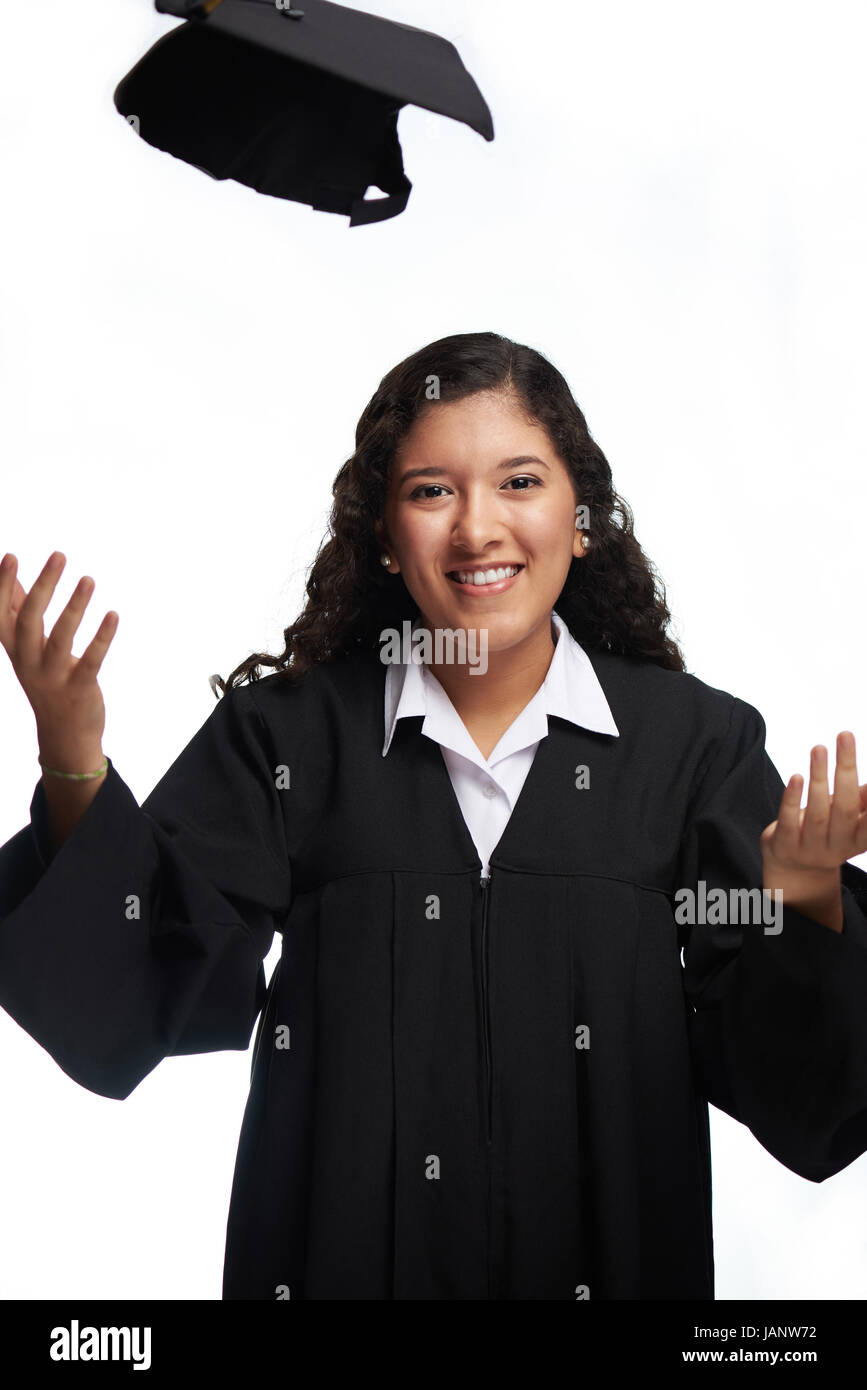 Young girl throwing student hat isolated on white background Stock ...