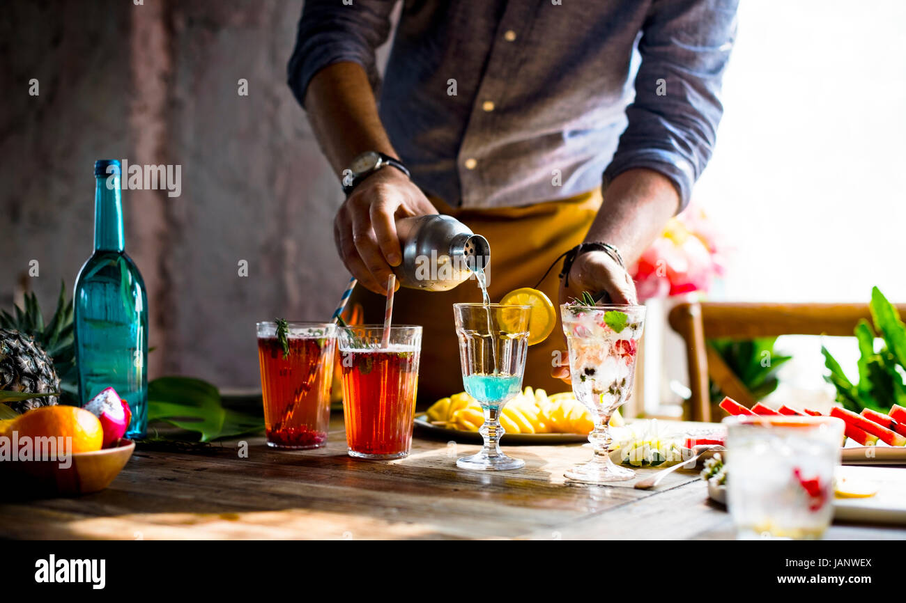 Bartender guy working prepare cocktail skills Stock Photo - Alamy