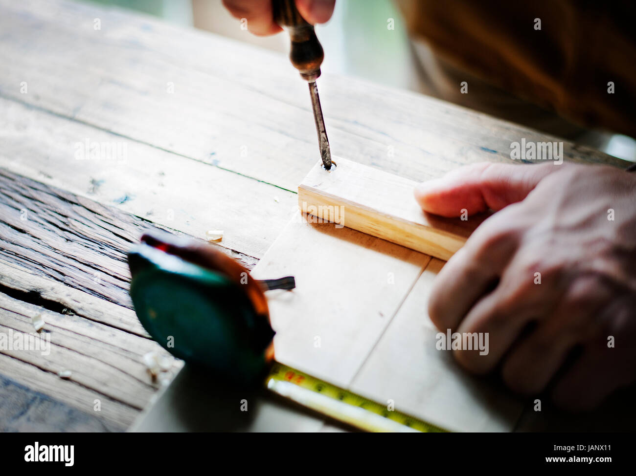 Closeup of carpenter man working with tools equipment set Stock Photo ...