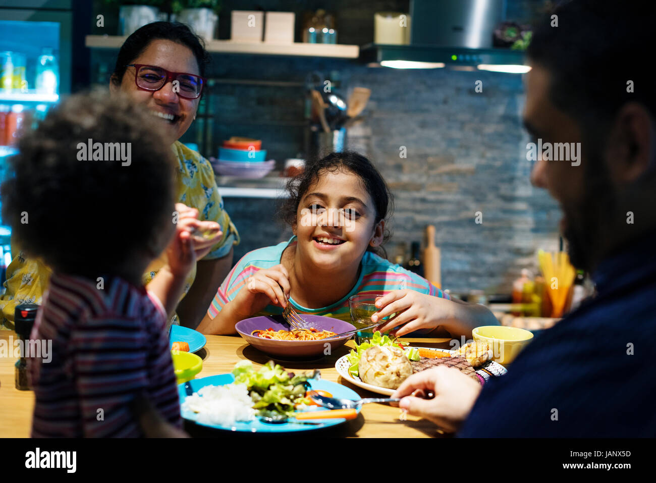 Brazilian family eating dinner together Stock Photo - Alamy