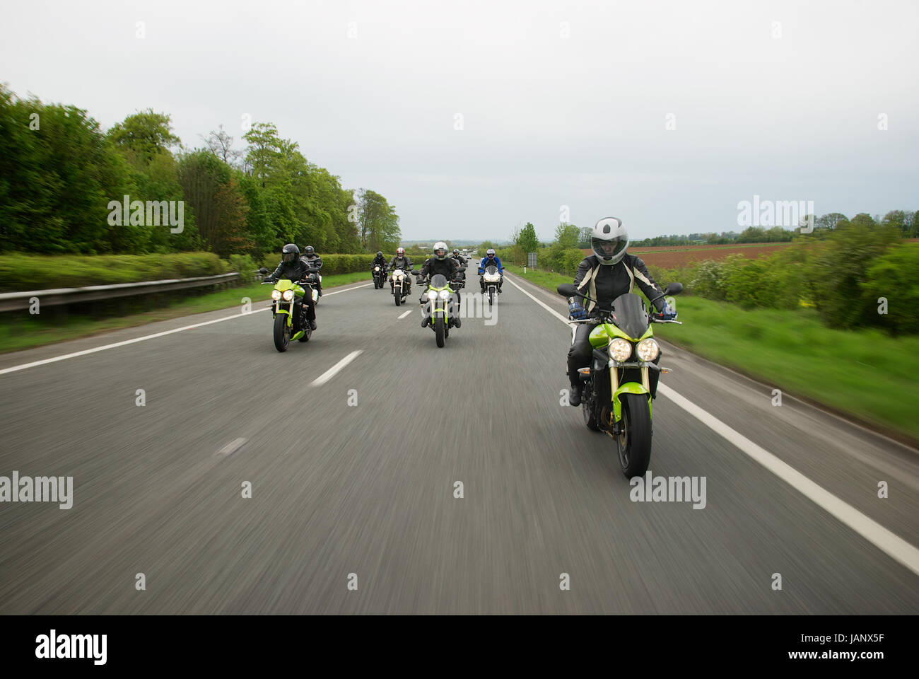 Group of motorcycles at speed on the highway with motion blur Stock ...