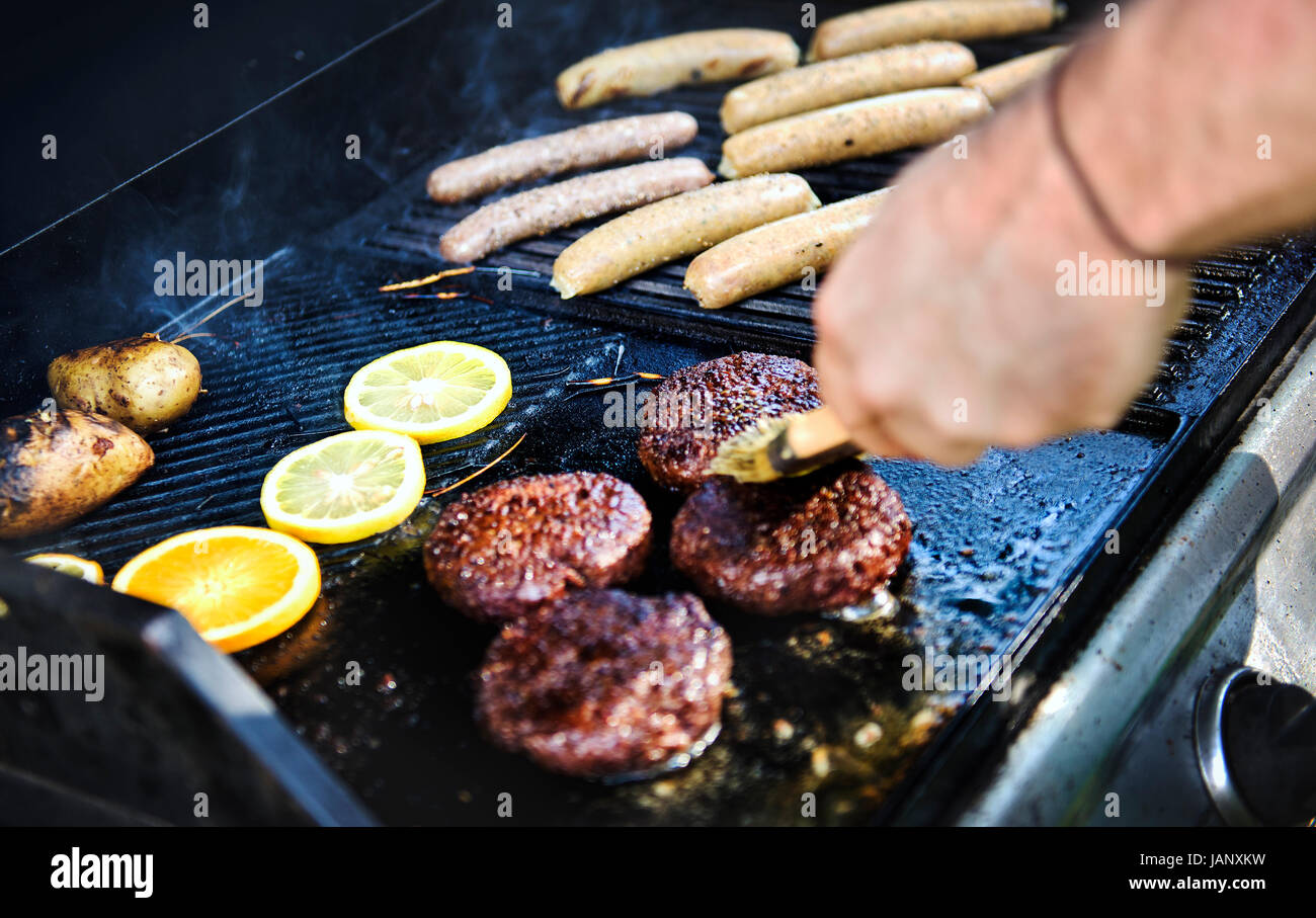Closeup of cooking burger patties grill Stock Photo - Alamy