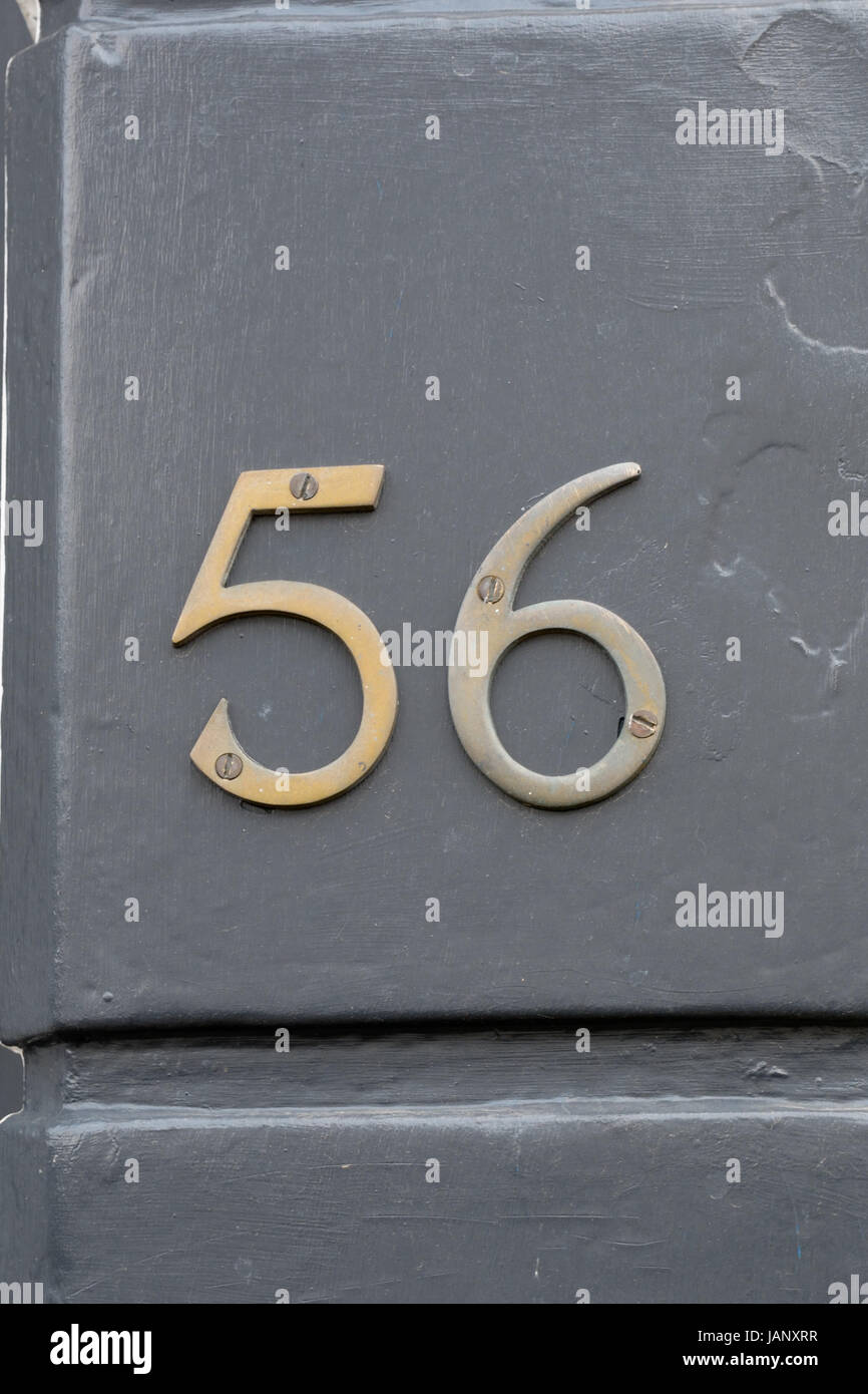 House number 56 sign on wall Stock Photo - Alamy
