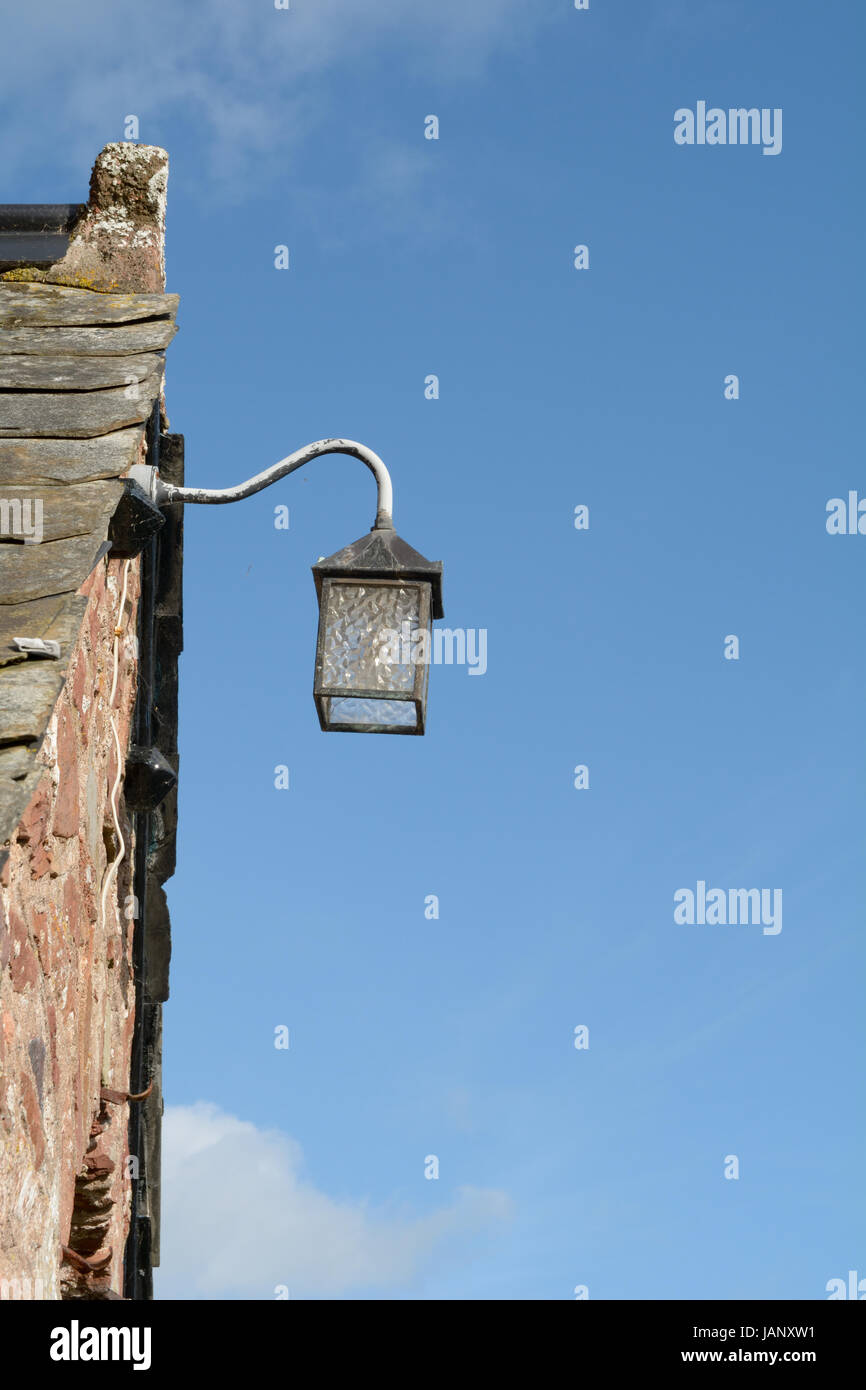 Light outside the entrance to Saint Nicholas Church Ringmore in the ...