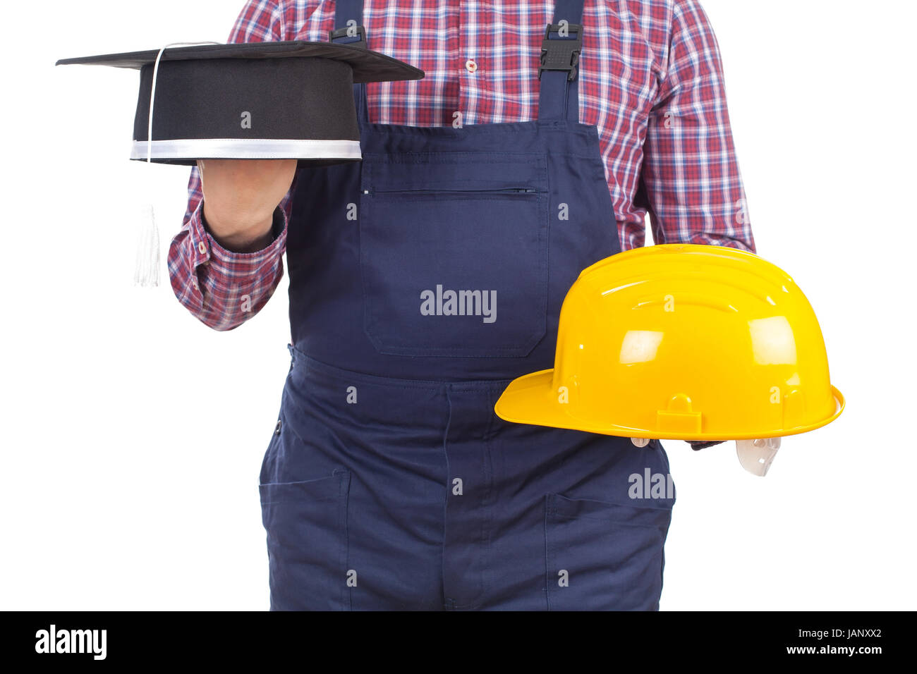 Close up picture of a young engineer holding his helmet and graduation ...