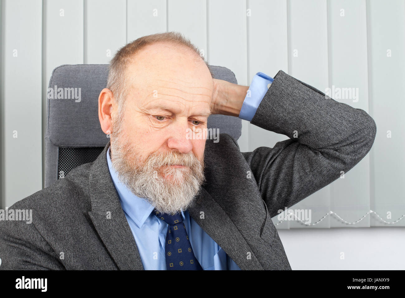 Picture of a stressed businessman at the office Stock Photo - Alamy