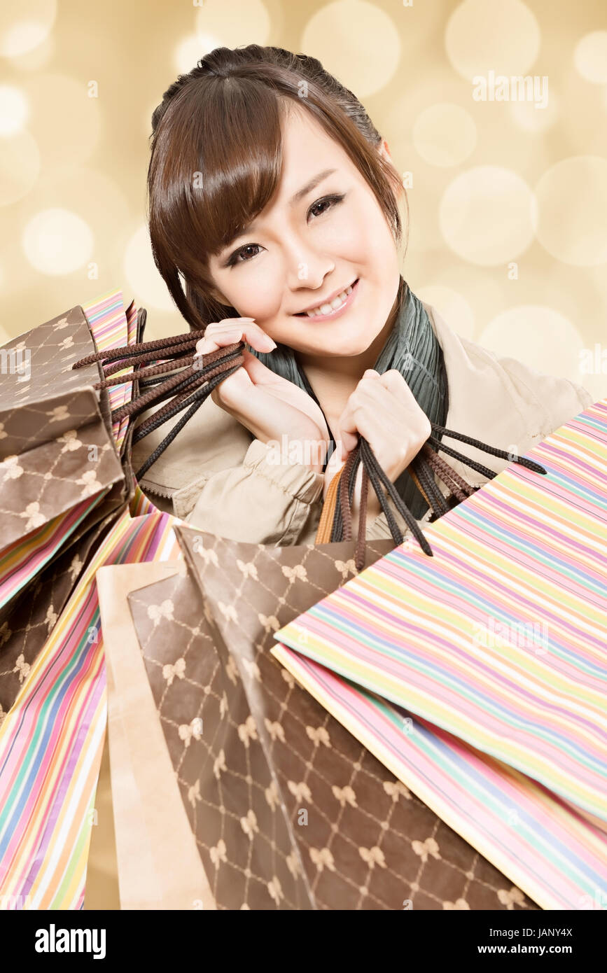 Happy smiling shopping girl, closeup portrait Stock Photo - Alamy