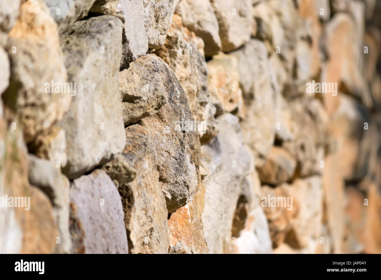 lateral view with selective focus of a dry-stone wall Stock Photo - Alamy