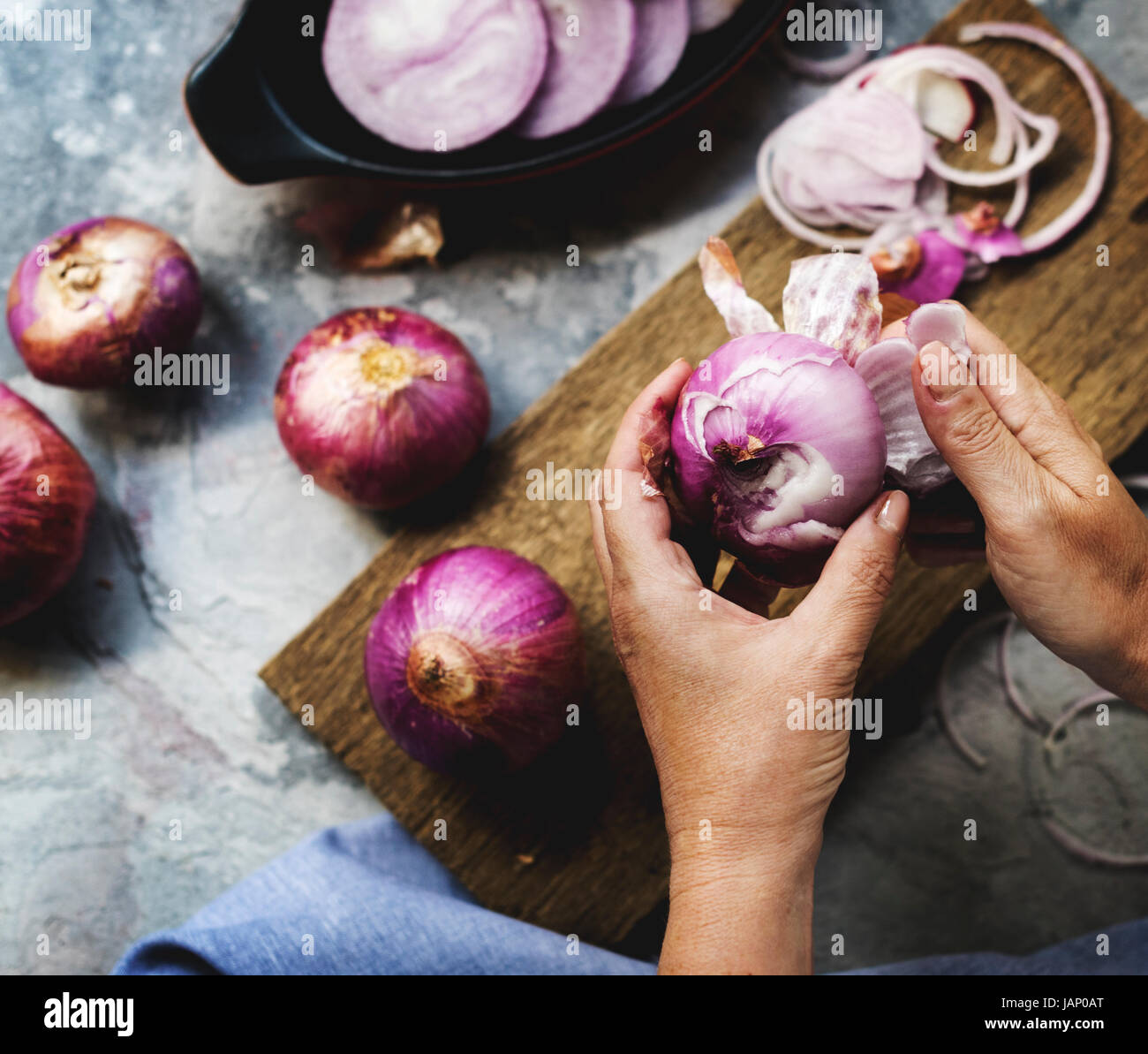 Peeling the onion hi-res stock photography and images - Alamy