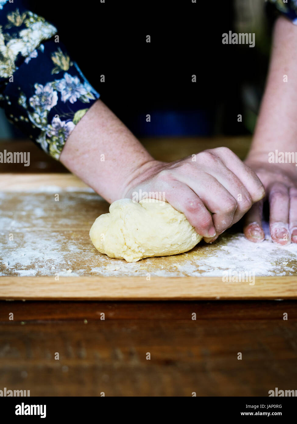 Close up of hands kneading dough for pastry Stock Photo - Alamy