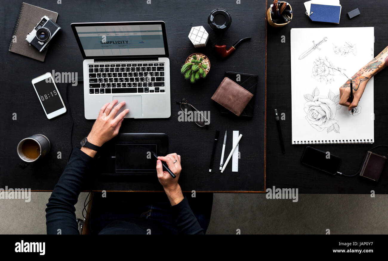 Aerial view of hands working with computer laptop at the office Stock ...