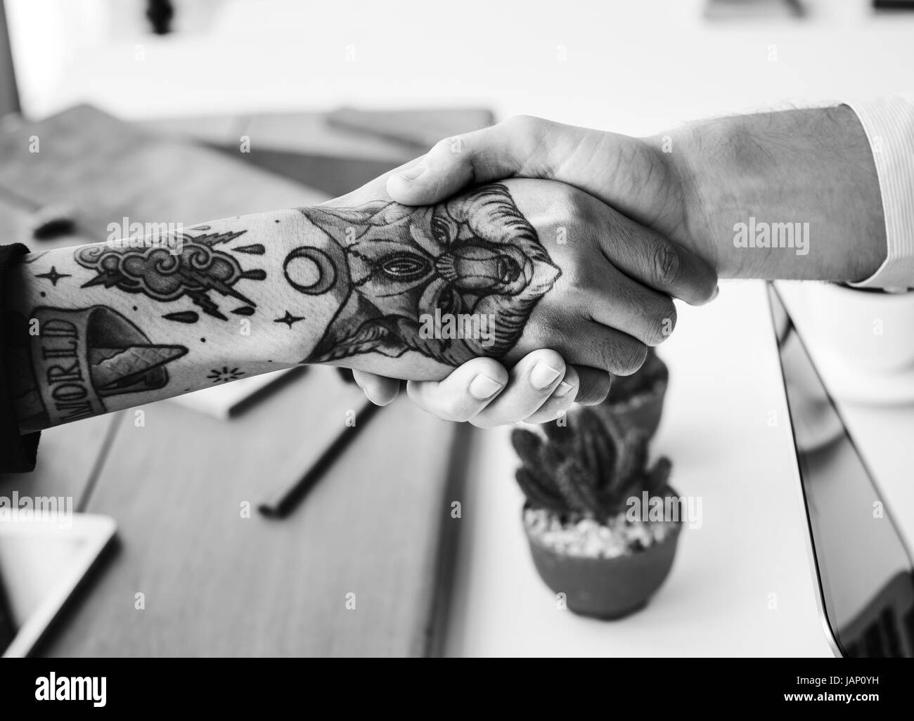 Closeup of hands shaking together collaboration Stock Photo - Alamy