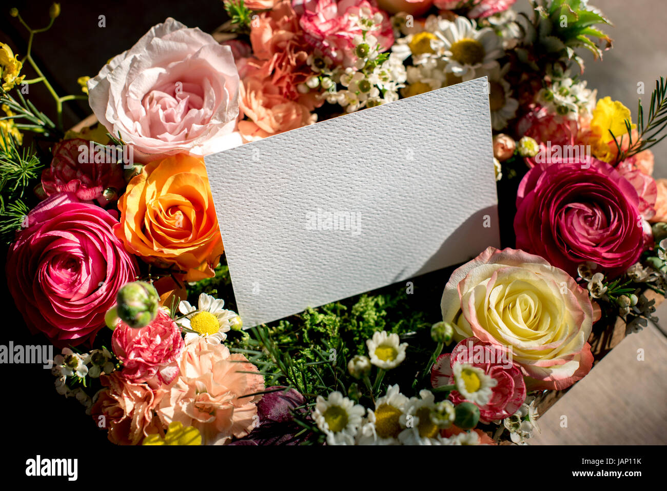 Flower bouquet with card Stock Photo - Alamy