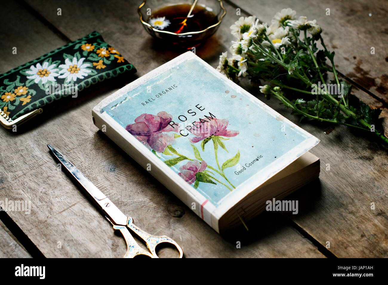 Aerial view of tea cup with flowers decoration Stock Photo - Alamy