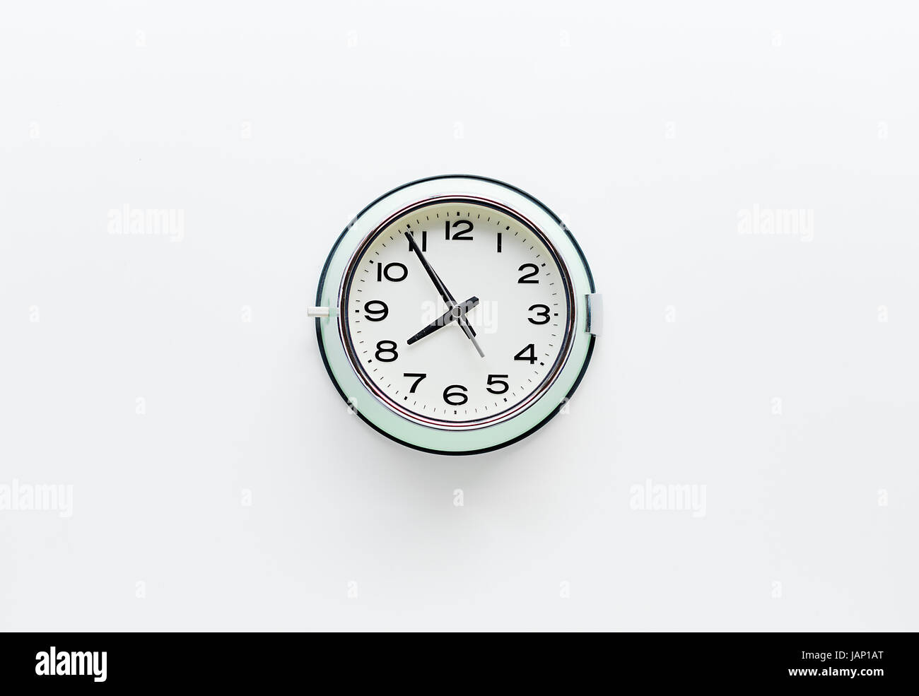 Round clock watch on white background Stock Photo - Alamy