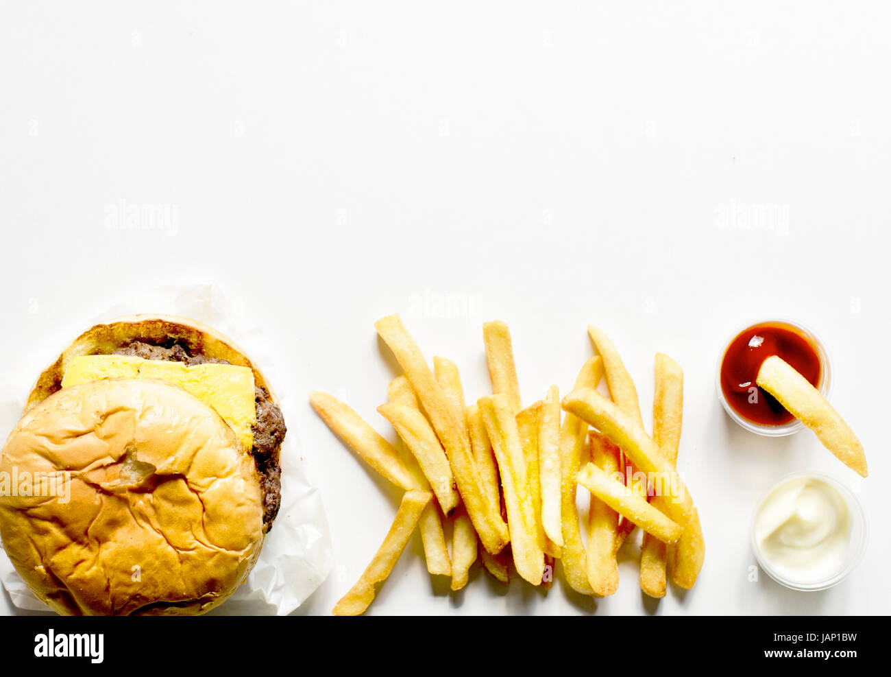 Aerial view of burger and fries fast food Stock Photo - Alamy
