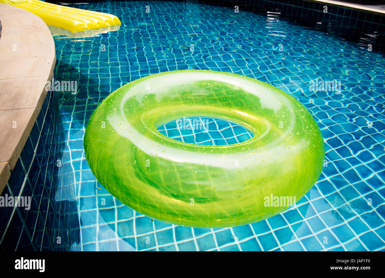 Closeup of inflatable tubes in swimming pool Stock Photo - Alamy
