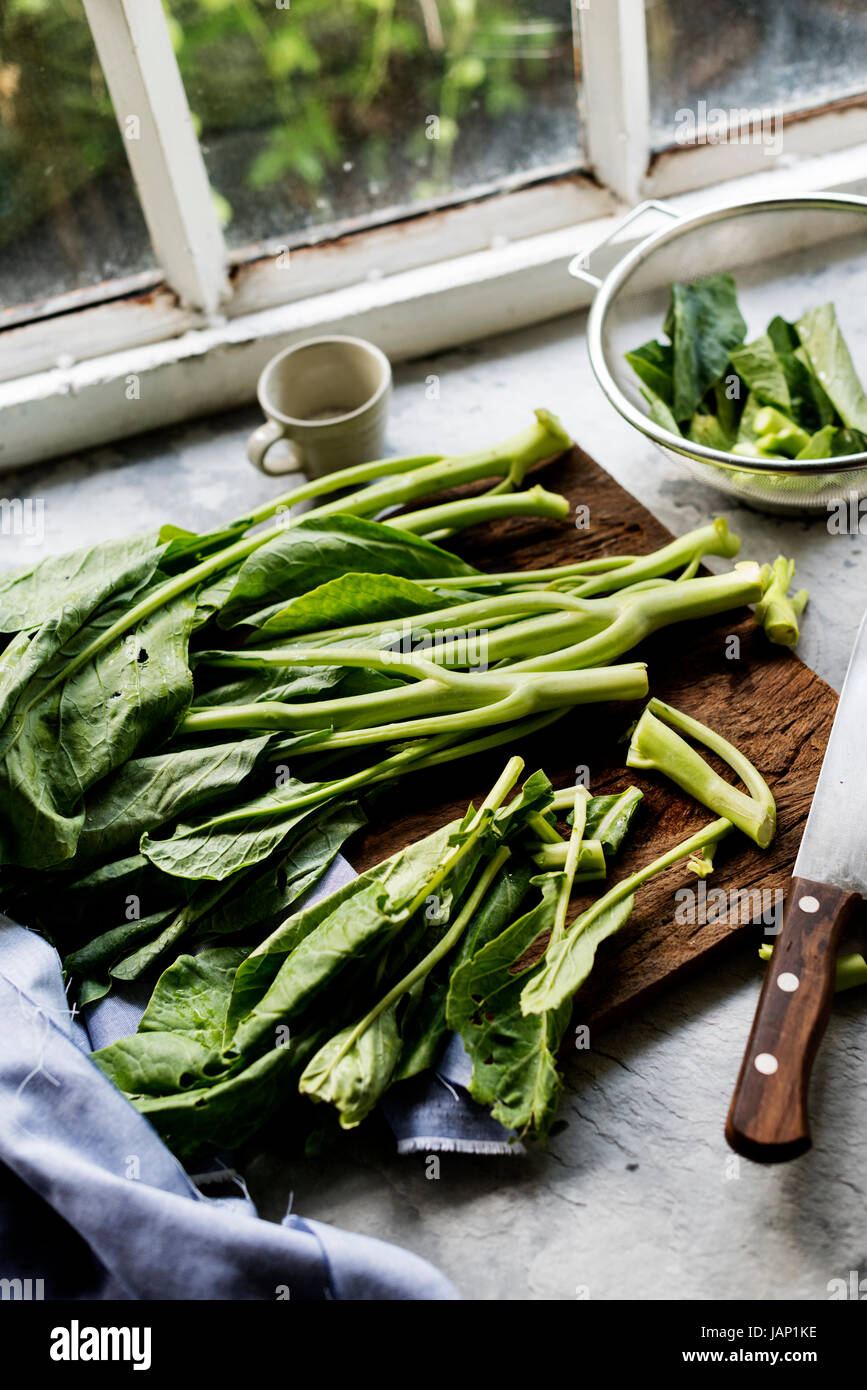 Aerial view of fresh collard chinese kale on wooden cutboard Stock ...