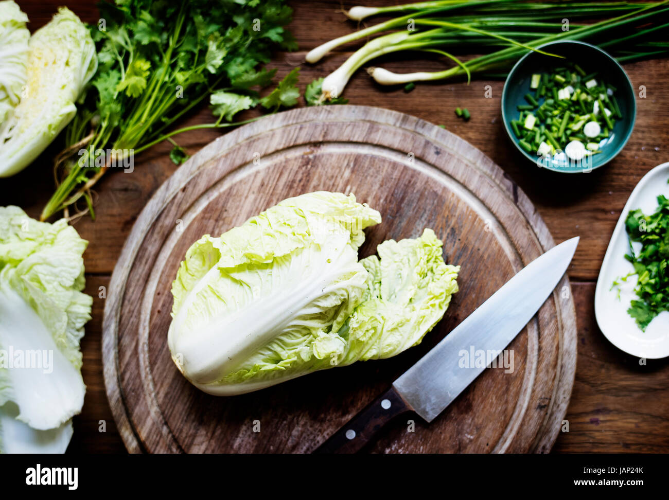 Aerial view of knife with fresh organic chinese cabbage Stock Photo - Alamy