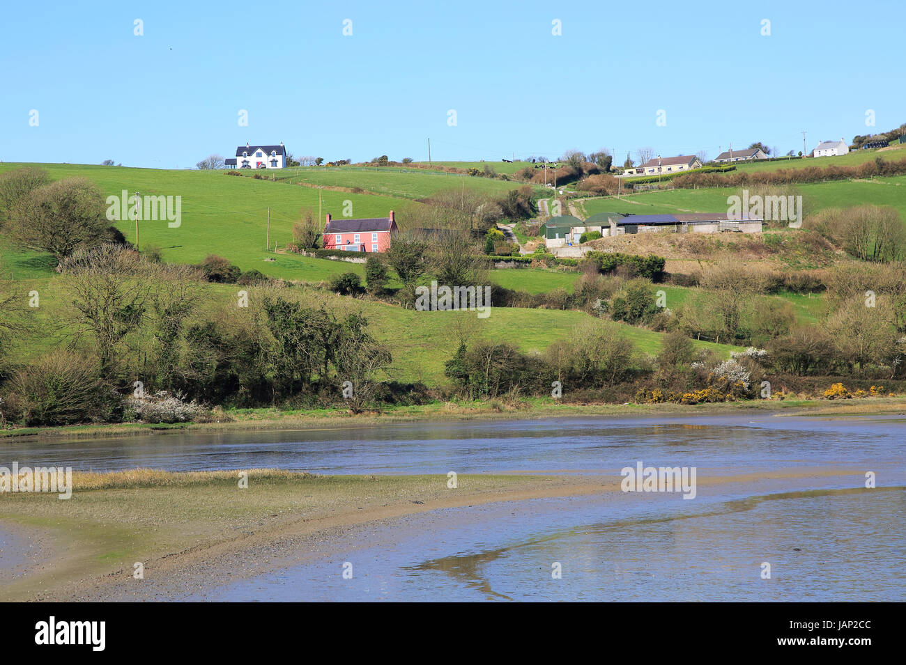 Coastal rural scenery River Arigideen estuary low tide, Burren ...