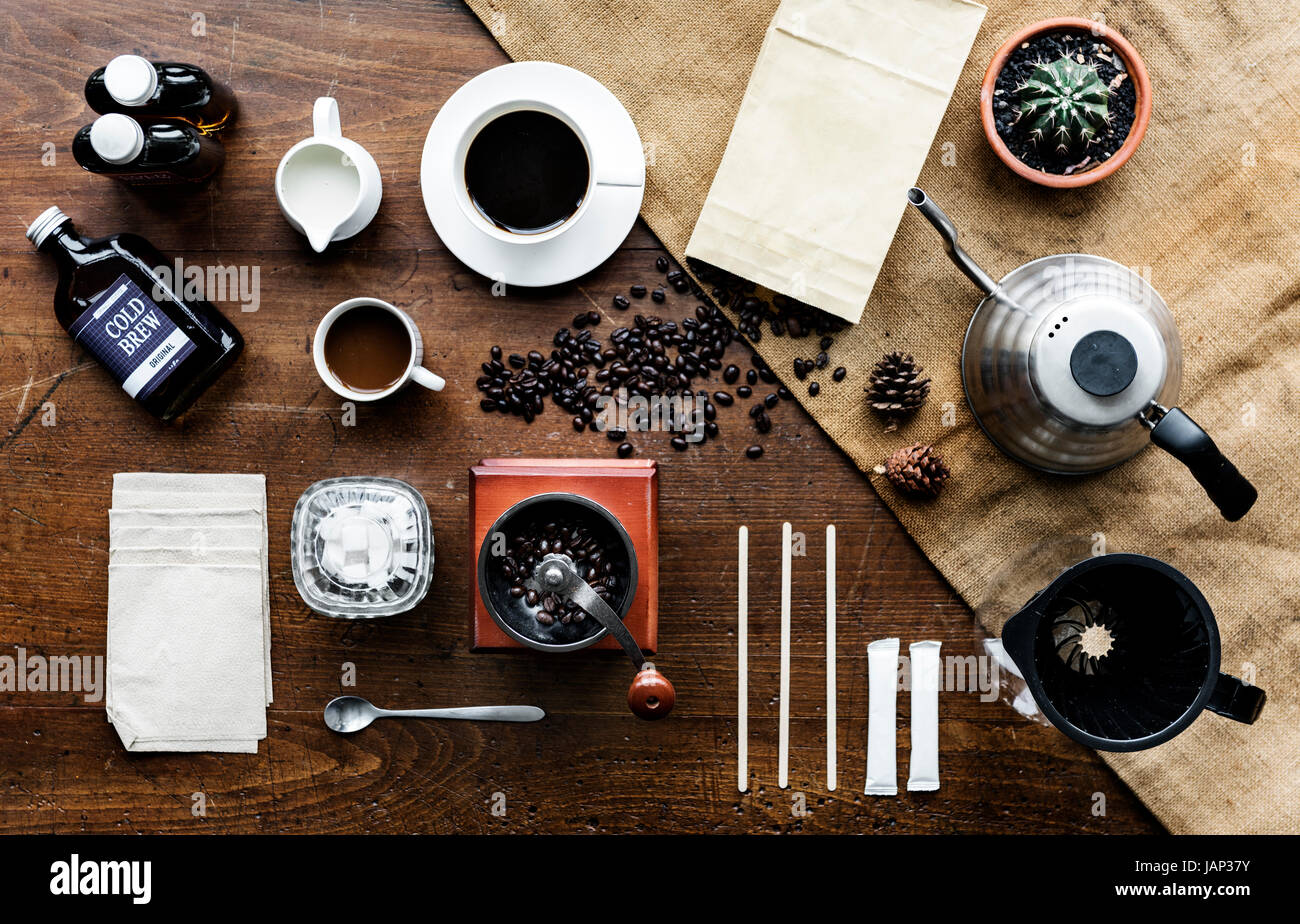 Aerial view of coffee setting on wooden table Stock Photo - Alamy