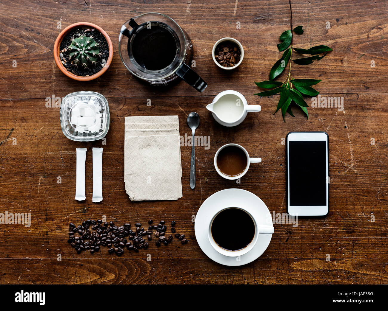 Aerial view of coffee setting on wooden table Stock Photo - Alamy