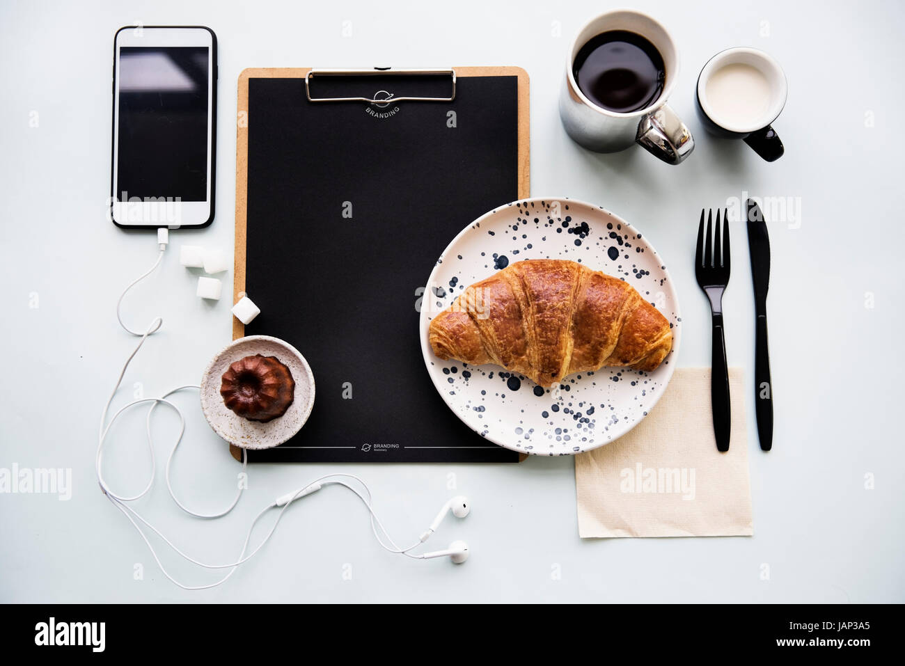 Aerial view of croissant coffee cup and paper clipboard Stock Photo - Alamy