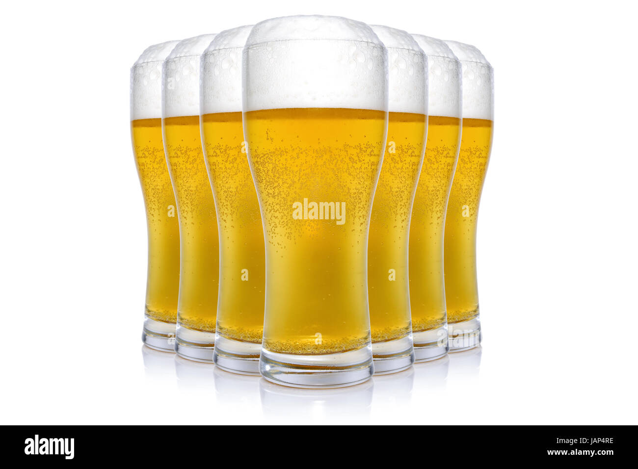 Seven beer glasses arranged over a white background Stock Photo - Alamy