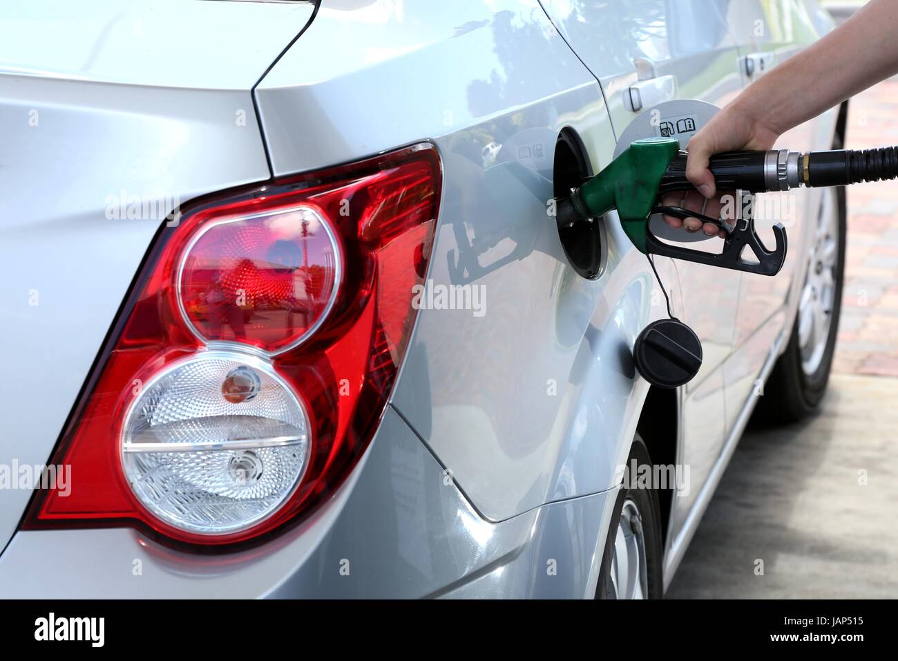 Petrol being pumped for you hi-res stock photography and images - Alamy