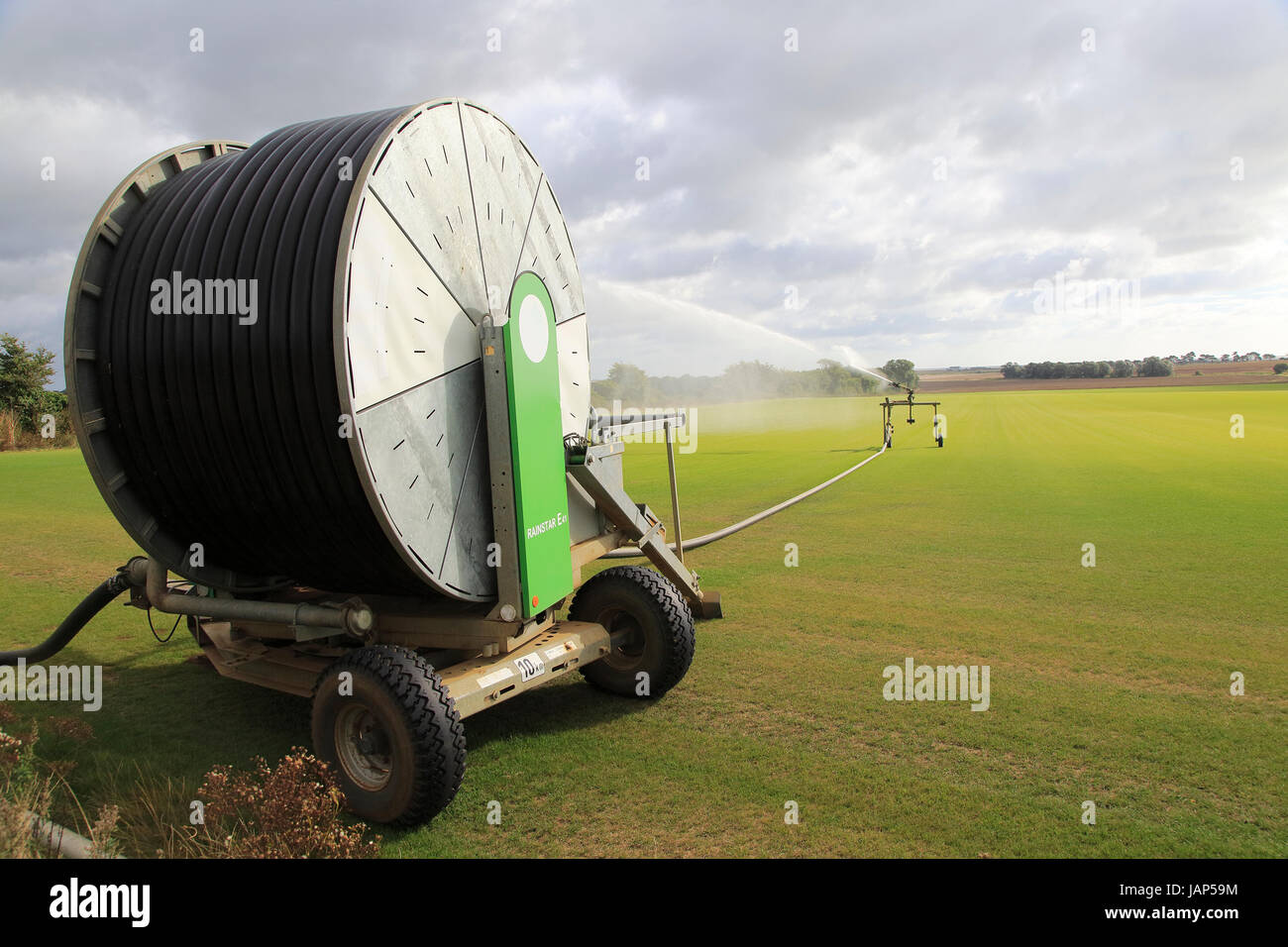 Rainstar irrigator crop sprayer field of grass turf, Alderton, Suffolk ...