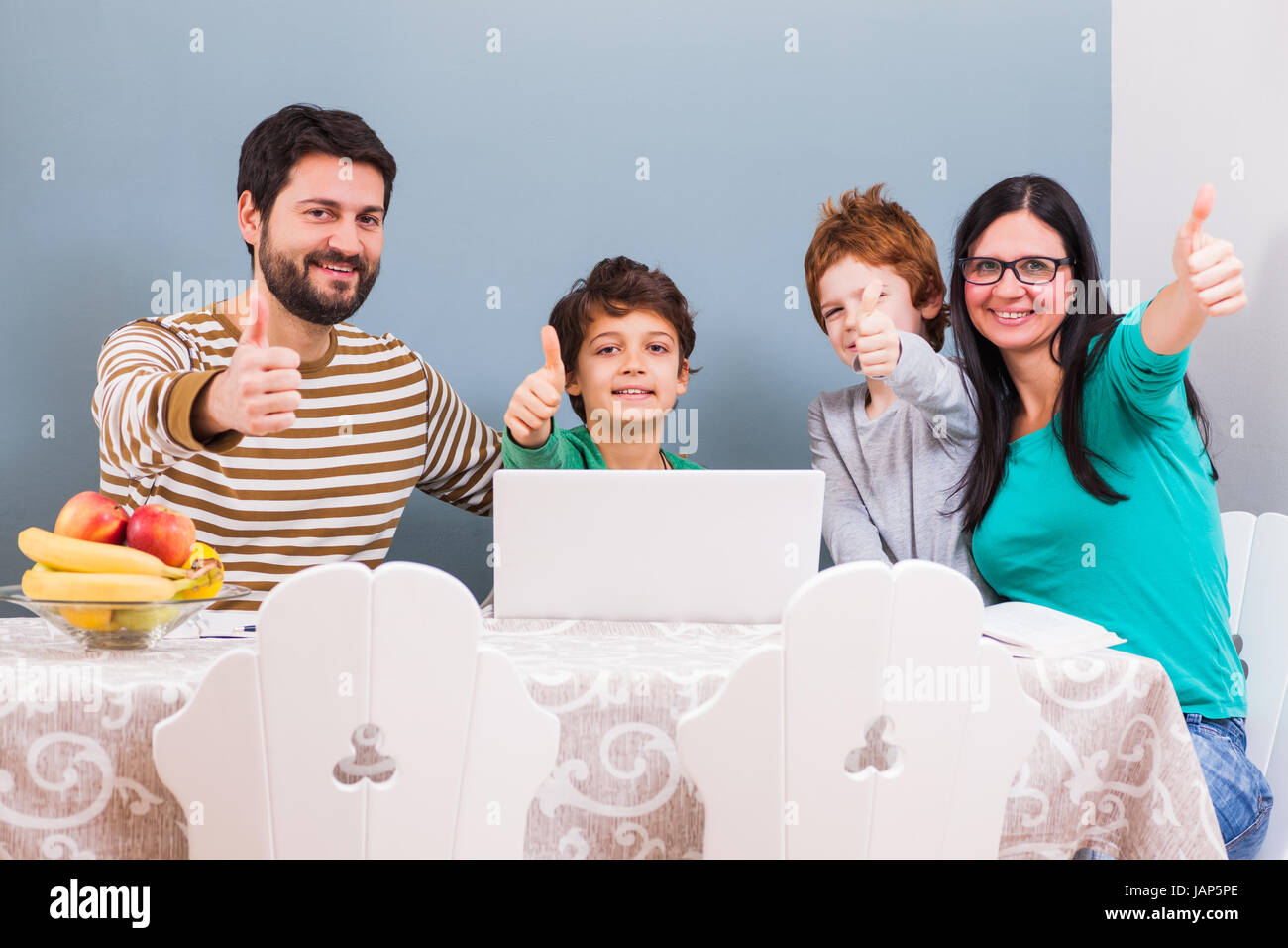 Parents are teaching their children at home Stock Photo - Alamy