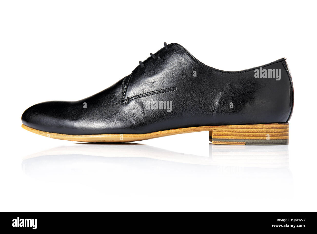 Studio shot of black shoe. Isolated on white Stock Photo - Alamy