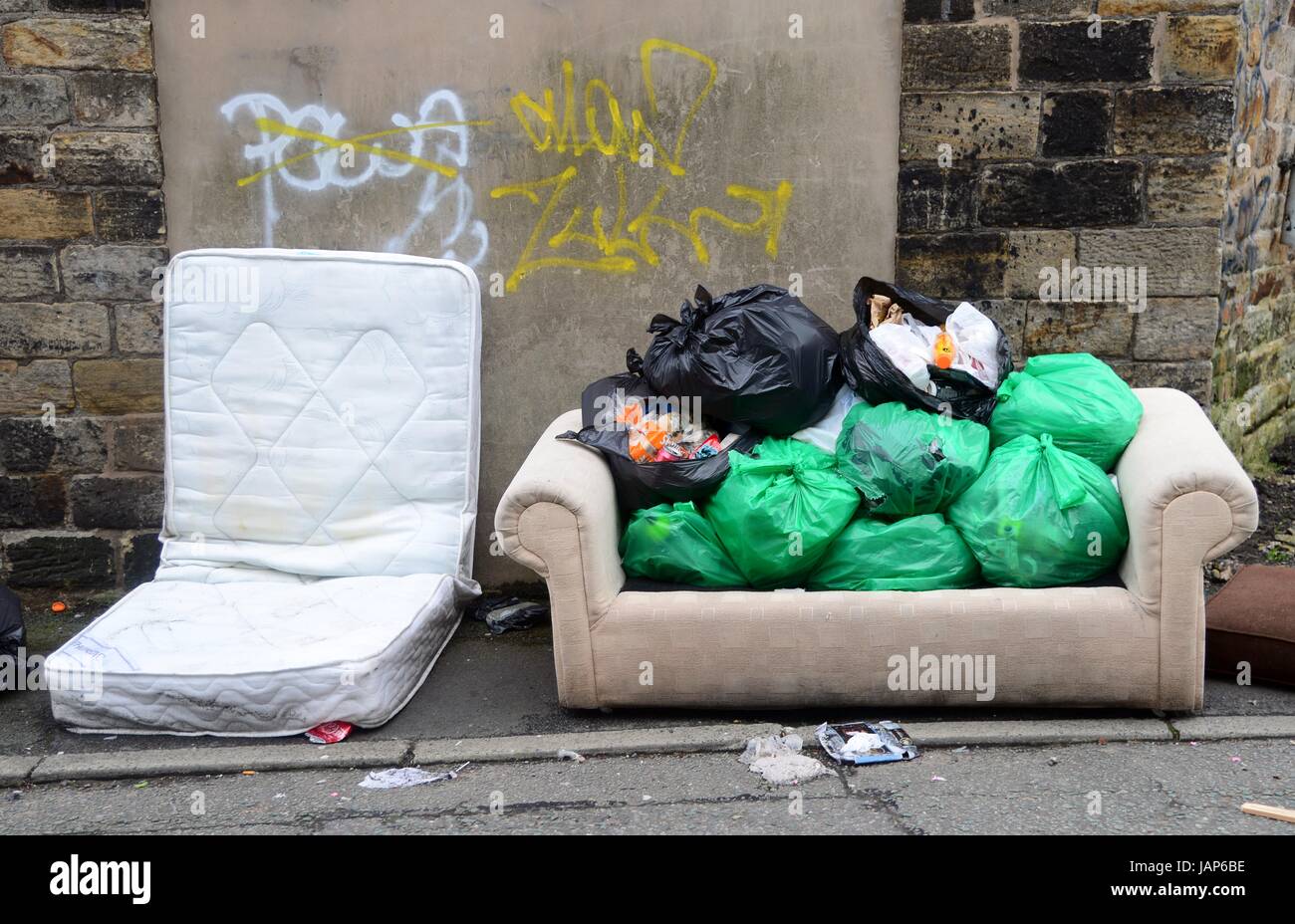 Tipped rubbish bin hi-res stock photography and images - Alamy